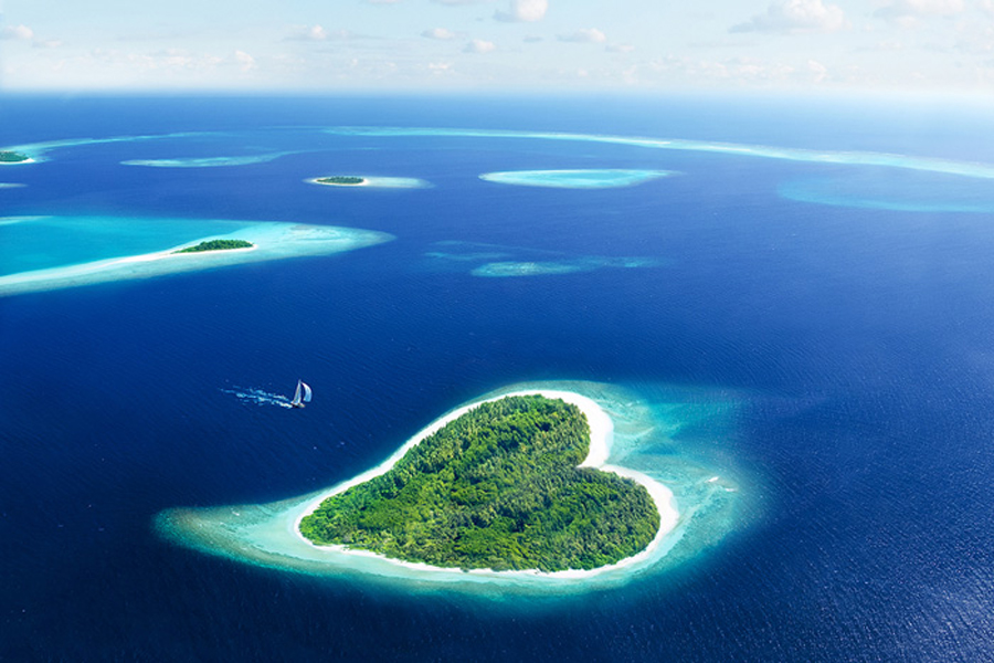 Maldivian Heart Shape Island, Giclee canvas prints at Eurographics